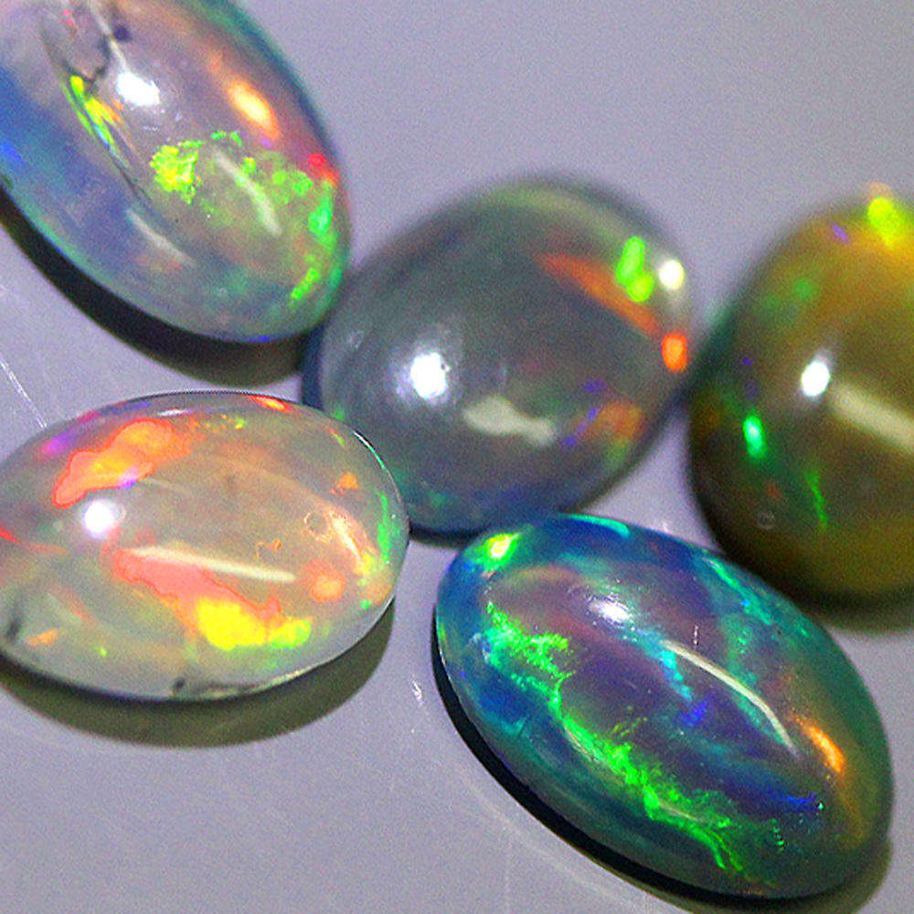 Opal - 1.03Ct. Opal Oval Cabochon 5 Pieces Multi Colors Rainbow 3D Ethiopian Gemstone was sold ...