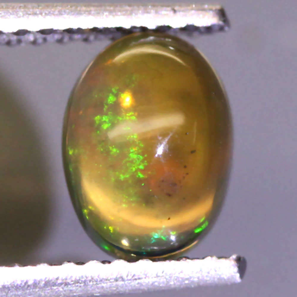 Opal - 0.75Ct. Opal Oval Cabochon Multi Colours Glittering Rainbow 3D! Ethiopian Natural was ...